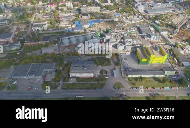 Fly over a large railway junction. Freight trains stand at the railway ...