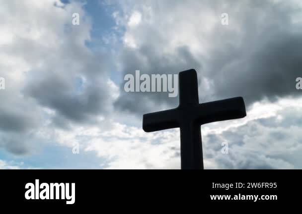 B roll of Timelapse wood cross worship christian with clouds moving ...