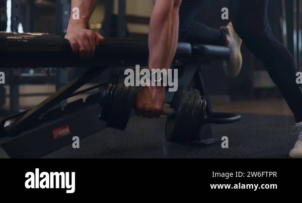 Handsome shirtless sporty muscular bodybuilder man excercise with ...