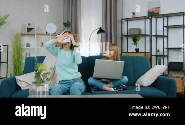 Beautiful positive modern two different ages girls spending joint ...