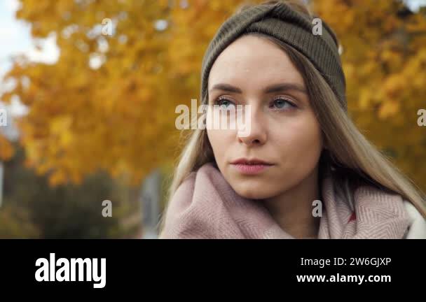 Portrait of calm young pretty girl looking away with lively emotion ...
