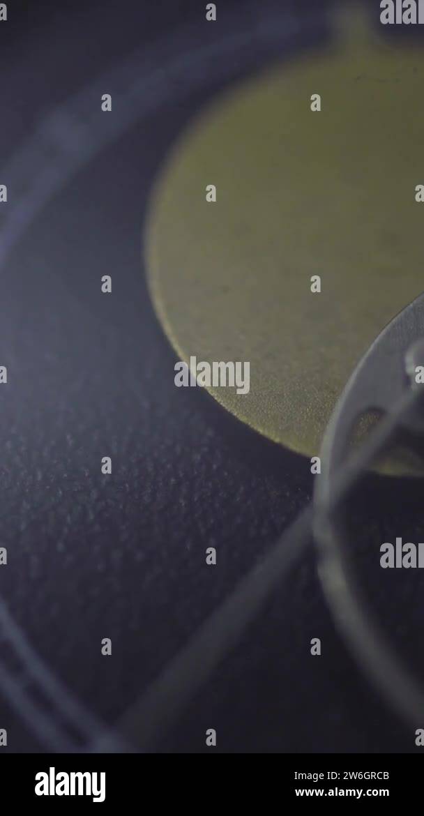 Vertical video Counting time on vintage watch mechanism, vintage clock ...