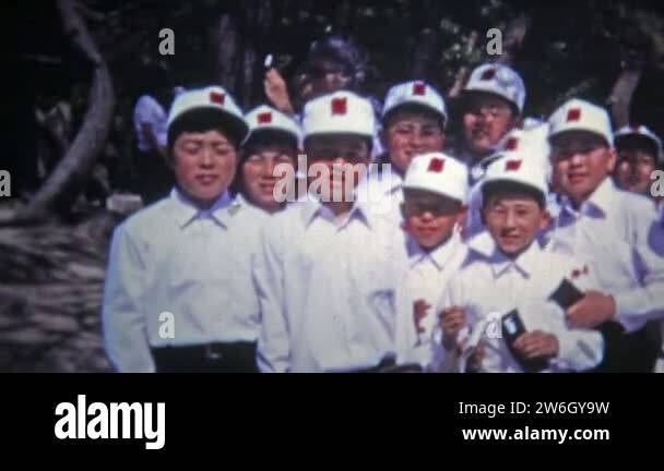 Japanese school boys waving goodbye to foreign exchange teacher Stock ...