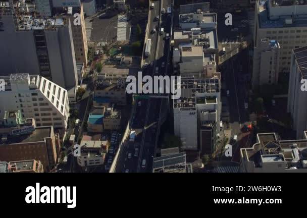 Tokyo, Japan circa-2018. Overhead aerial view of highway going through ...