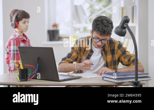 Boy homework distracting Stock Videos & Footage - HD and 4K Video Clips ...