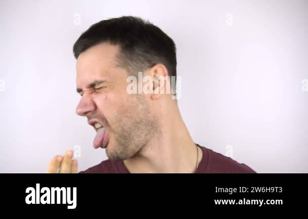 A young attractive guy gets a slap in the face from his girlfriend ...