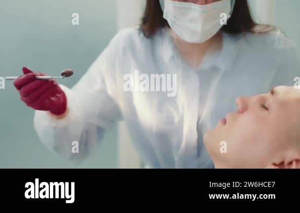 Mirror examination Stock Videos & Footage - HD and 4K Video Clips - Alamy