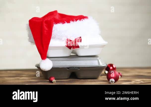 Christmas decor of food delivery service containers. New year eve ...