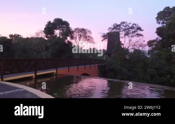 From Beautiful Water Source In Sunset Color To People Sitting Near ...