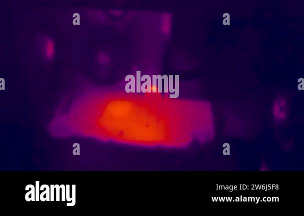 Thermal infrared imaging view of computer system unit, motherboard with ...