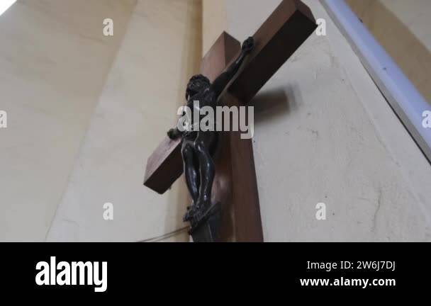 Large Wooden Cross with Crucified Jesus Christ Hanging on the Wall in ...