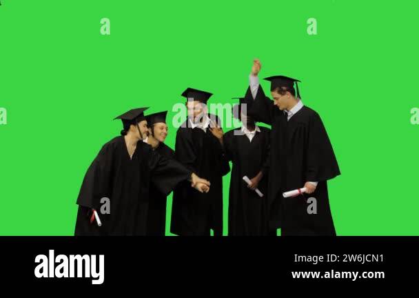 Young happy people at the graduation ceremony, group high five on a ...