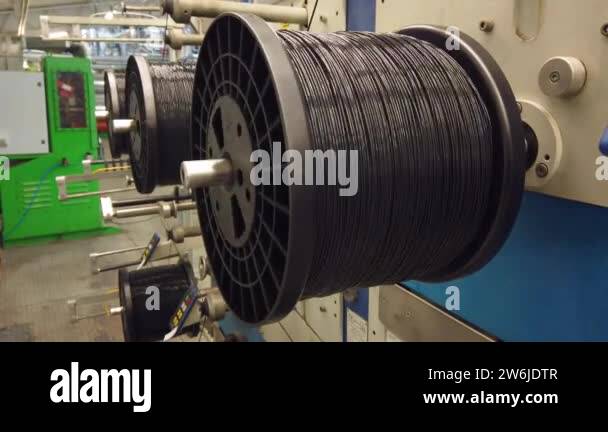Bobbin winding machine. Detail from a spool with plastic filament Stock ...