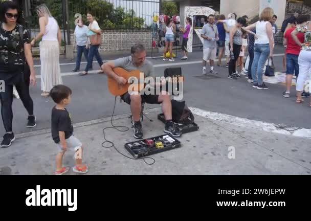 People watching street musician in Stock Videos & Footage - HD and 4K ...