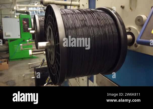 Bobbin winding machine. Detail from a spool with plastic filament Stock ...