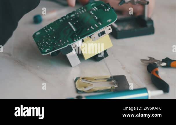 Man fixing an electronic device Stock Videos & Footage - HD and 4K ...