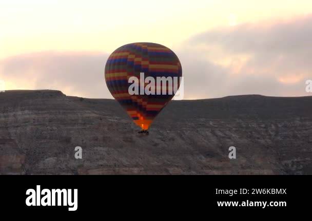 Preparations for inflating hot air balloons at night before sunrise ...