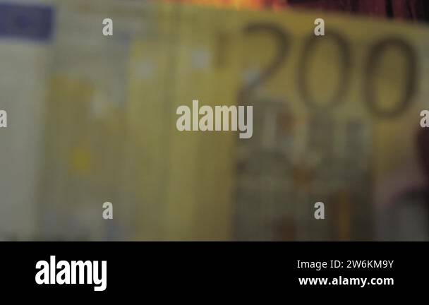 Closer look of the 200 Euro bill on the hands Stock Video Footage - Alamy