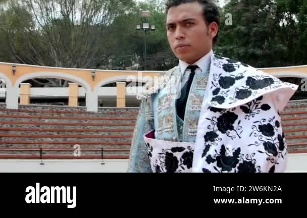 Bullfighter in blue suit of lights slowly walking in the bullring Stock ...