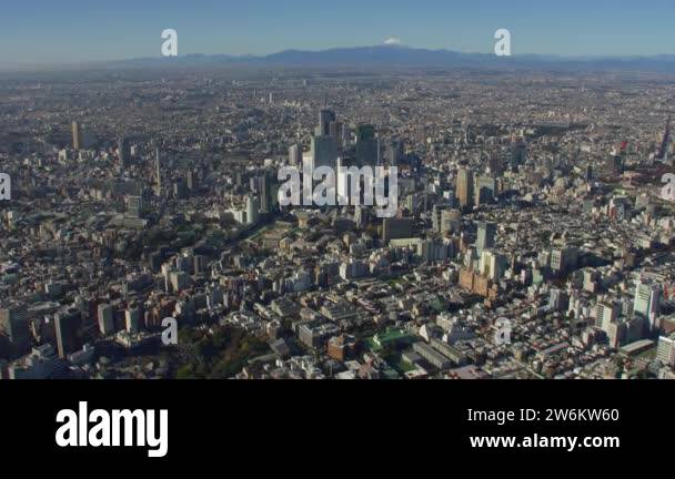 Tokyo, Japan circa-2018. Flying over Tokyo with view of Mt. Fuji. Shot ...