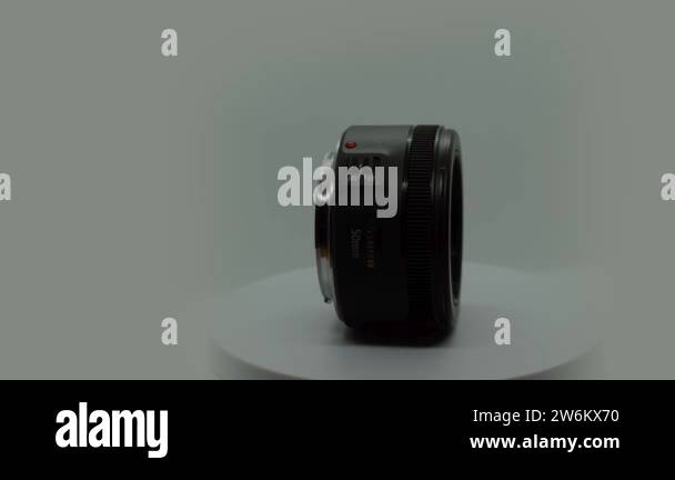 Side view of a portrait lens of 50mm STM EF lens rotating 360 degree ...