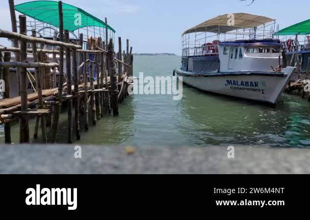 Kochi ,Kerala ,India, April 16 2021 a small tourist boat docked in ...