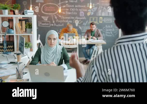 Angry boss yelling at employee standing in office screaming and ...
