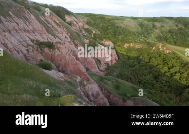 Aerial video of a canyon like formation in Romania, called The Red ...