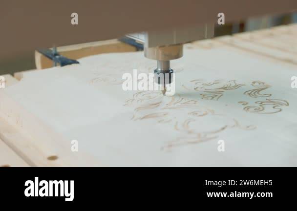 cutting a pattern de wood blank using a machine Stock Video Footage - Alamy
