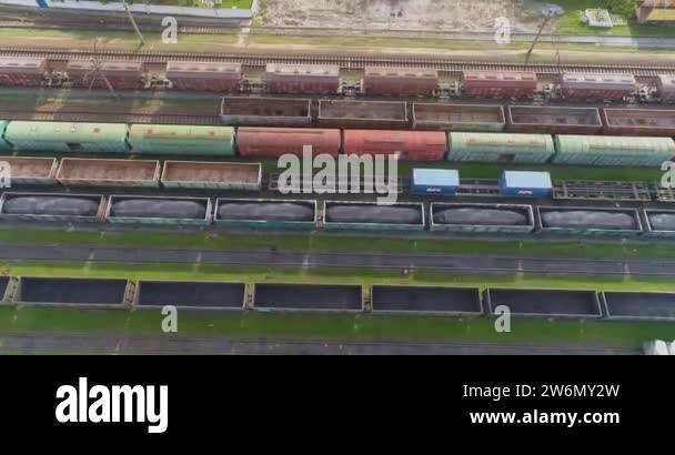 Flying over trains at the depot. Top view of freight trains at a ...