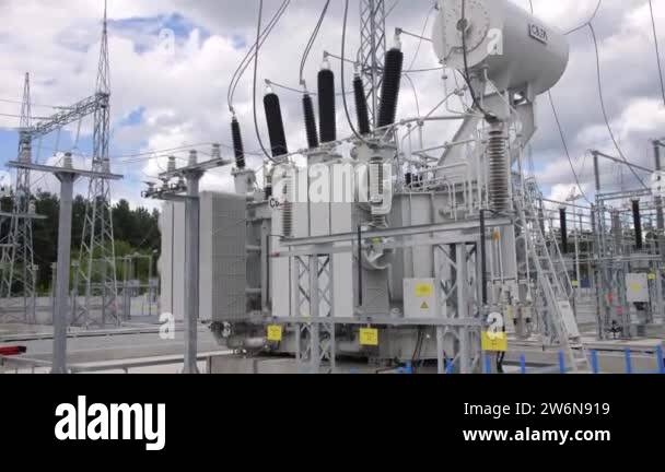 Transformer block with insulators and logo at substation Stock Video ...