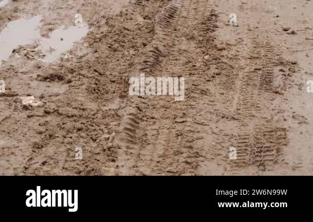 Car tracks mud Stock Videos & Footage - HD and 4K Video Clips - Alamy