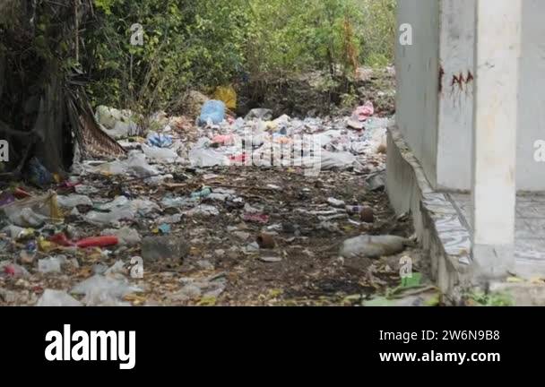 Garbage in Africa Lies near Houses in the Poor Tropical Village, Trash ...
