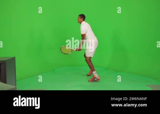 Professional tennis player makes different types of shots on a green ... Professional tennis player makes different types of shots on a green ...