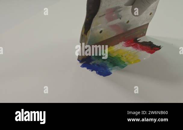 Use a color spatula to blend the colors together and wipe them together ...