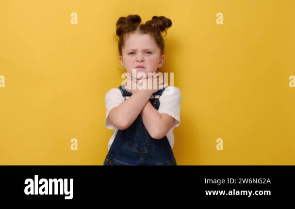 Unhealthy little girl kid touch neck feels discomfort painful feelings ...