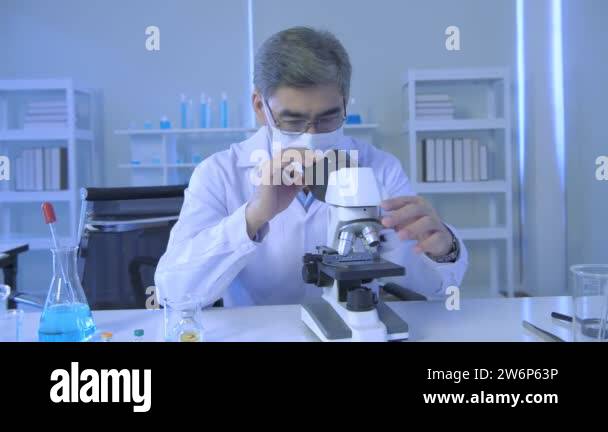 Research concept of 4k resolution. Asian scientists are examining the ...