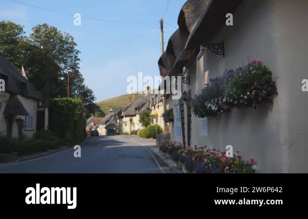 Thatched cottages street Stock Videos & Footage - HD and 4K Video Clips ...