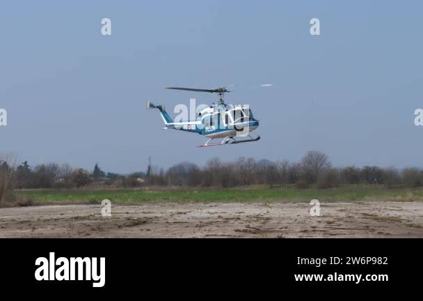 Agusta Bell AB-212 two blade helicopter of italian police landing on ...