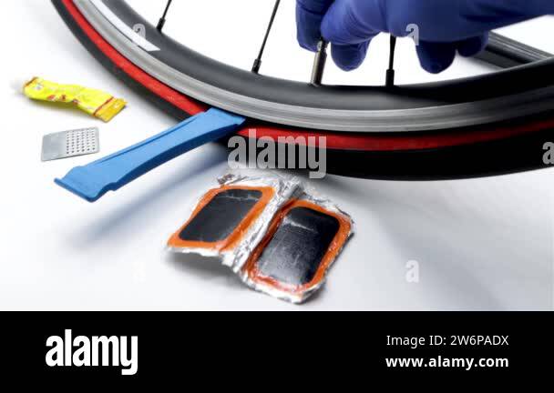 Repairing puncture on cycle Stock Videos & Footage - HD and 4K Video ...
