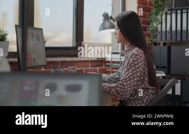 Portrait of person designing data charts on computer Stock Video ...