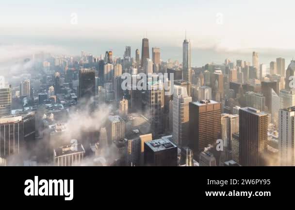Incredible aerial skyline time lapse as patches of dense low fog makes ...