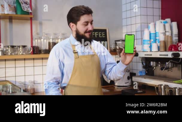 Barista holding blank screen Stock Videos & Footage - HD and 4K Video ...