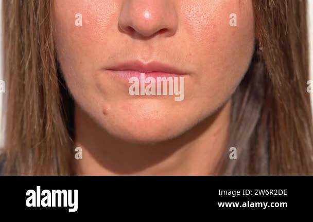 Young woman showing her mouth without tooth on lower jaw. Missing tooth ...