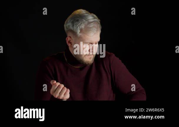 Handsome disco dance man dancing to music rhythmically, moving hands on ...