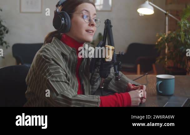 Beautiful woman sitting microphone headphones Stock Videos & Footage ...