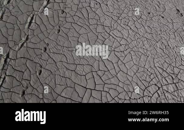 Top view dry shore full of clay of dried up sea, global warming and ...