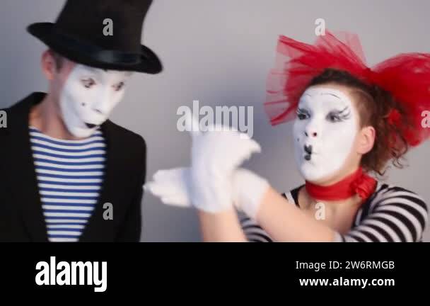 Two Mimes Depicts bird Stock Video Footage - Alamy