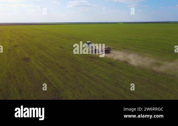 Application of solid fertilizers to crops of grain barley and wheat ...