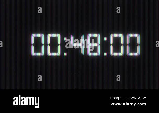 One minute digital clock countdown timer of glowing led white digits on black background. 60 ...